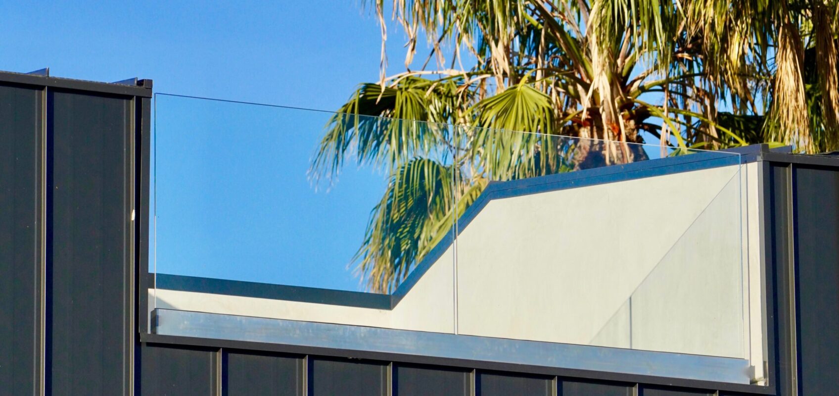 Base Shoe Glass Railing Installation - San Diego Independent Construction