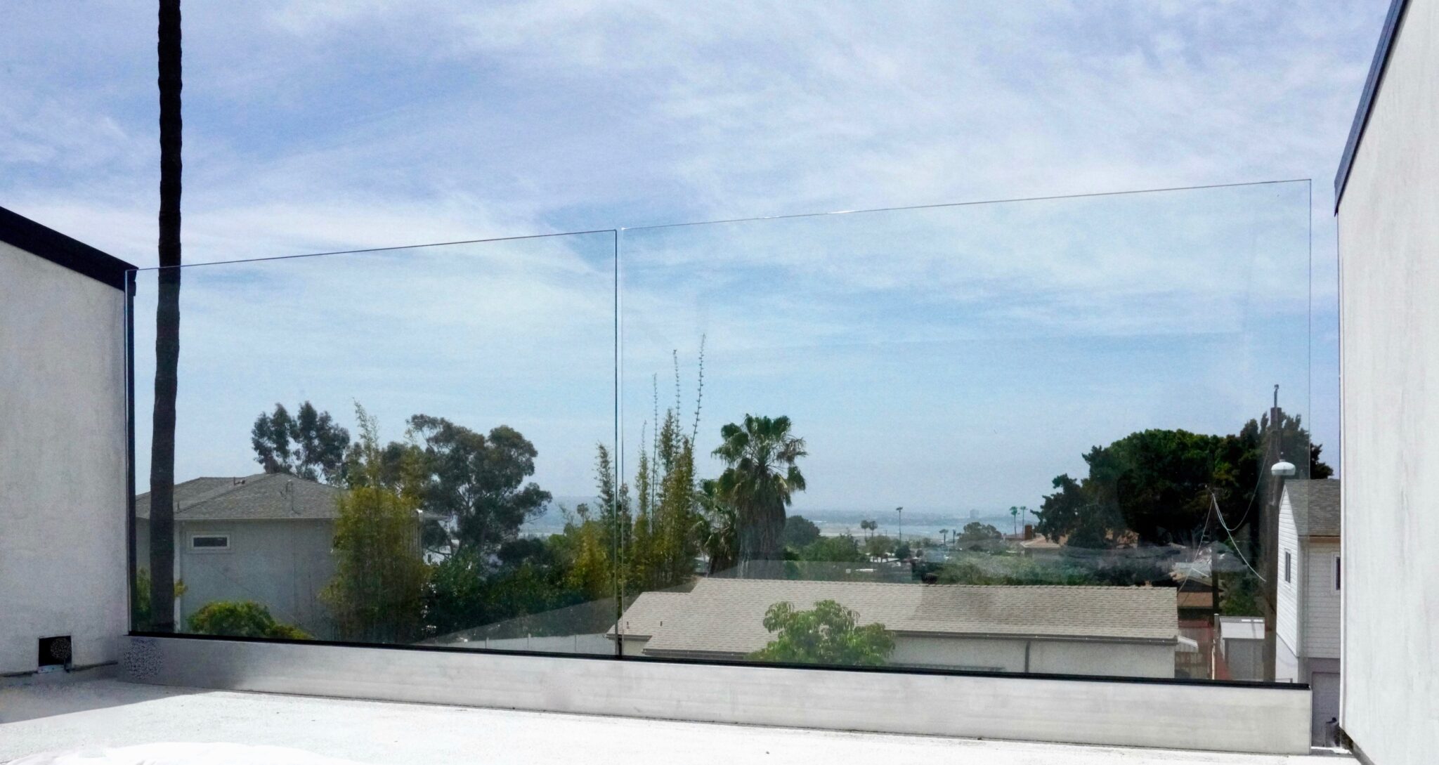 Base Shoe Glass Railing Installation - San Diego Independent Construction